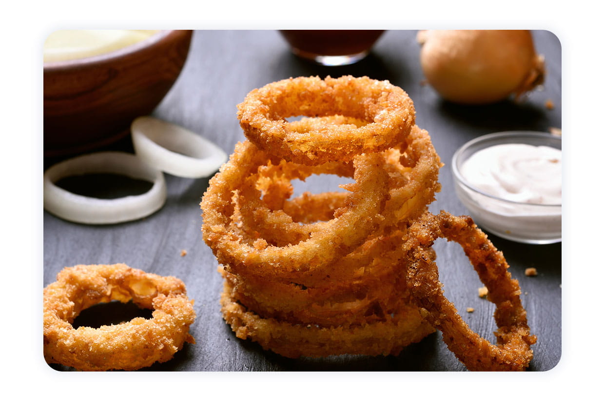 Rondelles d'oignon frites dans une pâte épicée | Sais